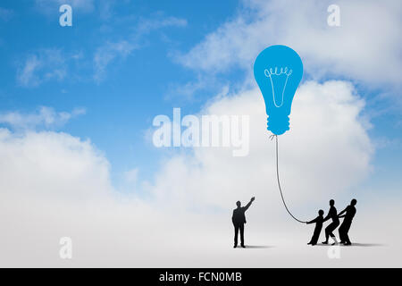 Little silhouettes of people pulling light bulb on rope Stock Photo - Alamy