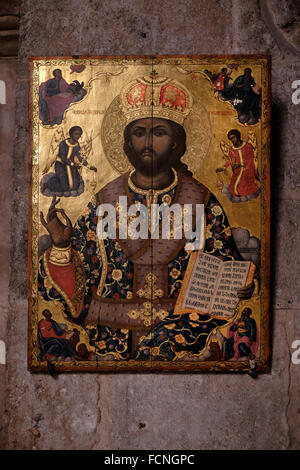 A golden Orthodox Christian icon depicting the Virgin Mary with her ...