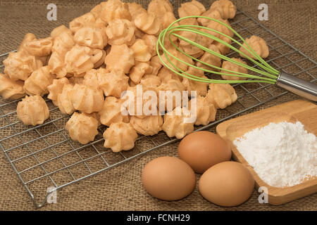choux cream or cream puff, eclair in the wooden dish Stock Photo - Alamy