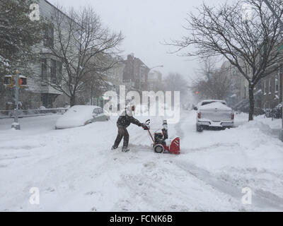 Brooklyn, New York, USA 23rd Feb., 2026 Delivery workers move down snow ...