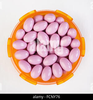 Pretty little pink pills Stock Photo - Alamy