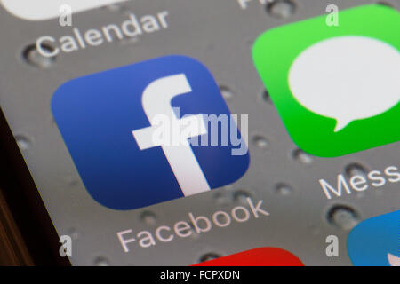 Facebook application icon on Apple iPhone 13 Pro, holding smartphone ...