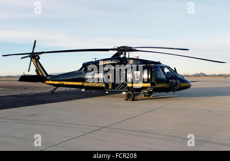 A US Customs and Border Patrol Blackhawk helicopter and crew patrol ...