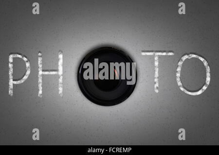 Word photo with camera zoom instead of letter O Stock Photo - Alamy