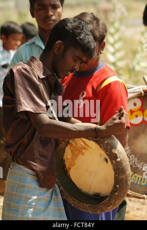 Man playing thappu drum in temple Festival Stock Photo - Alamy