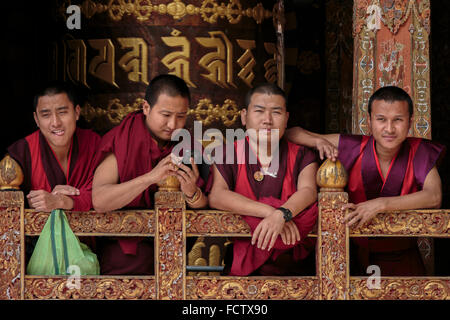 Four Monks in Bhutan Stock Photo - Alamy