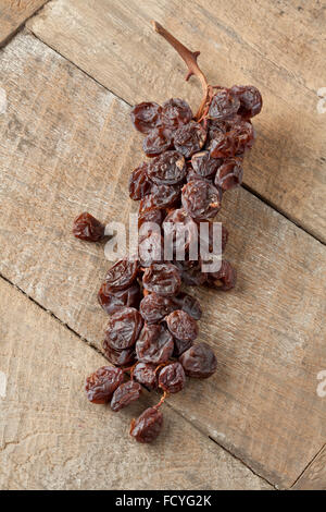 Organic Dried Brown Raisins in a Bowl Stock Photo - Alamy