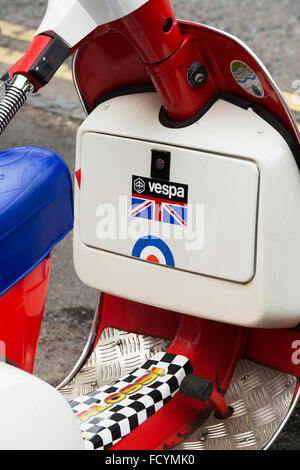 A Vespa scooter with Mod stickers Stock Photo - Alamy