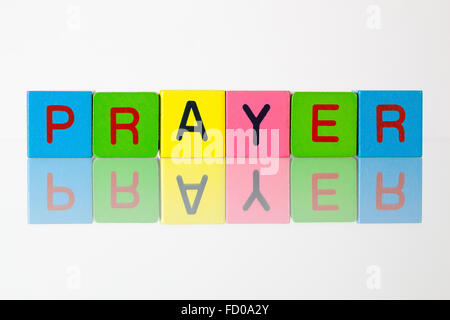 Prayer - an inscription from children's wooden blocks Stock Photo - Alamy