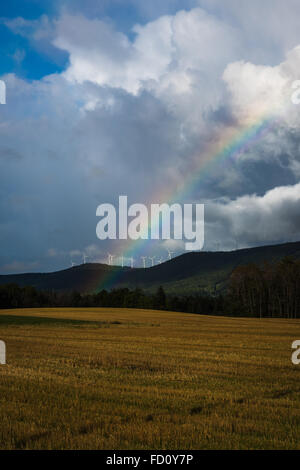 A rainbow arches over a wind farm on Mars Hill Mountain in Aroostook ...