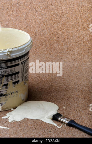 Paint can spilled Stock Photo - Alamy