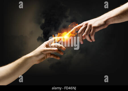 Michelangelo God's touch. Close up of human hands touching with fingers ...