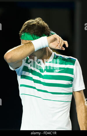 Melbourne, Australia. 28th Jan, 2016. Switzerland's Roger Federer wipes ...