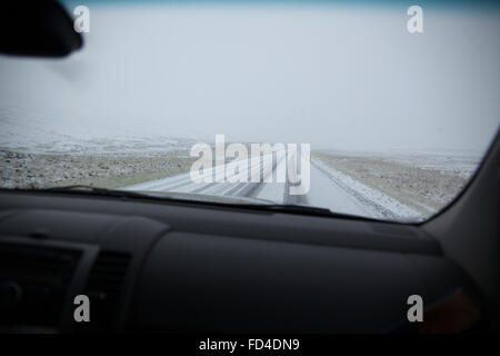 view through car windshield to snow-covered road Stock Photo: 93903671 ...