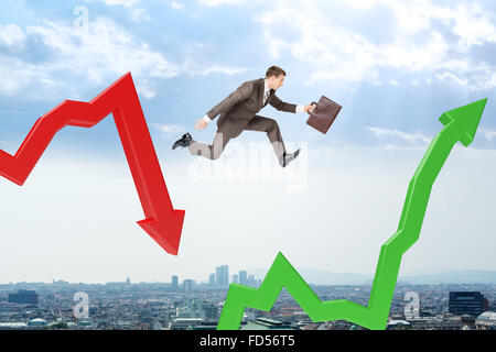 Businessman hopping arrows Stock Photo - Alamy
