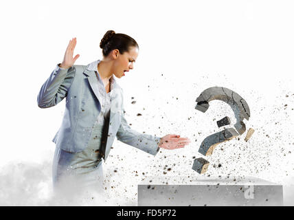 Image of businesswoman destroying with arm stone question mark Stock ...