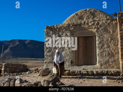 old widow woman in her troglodyte house, Kerman province, Meymand, Iran ...