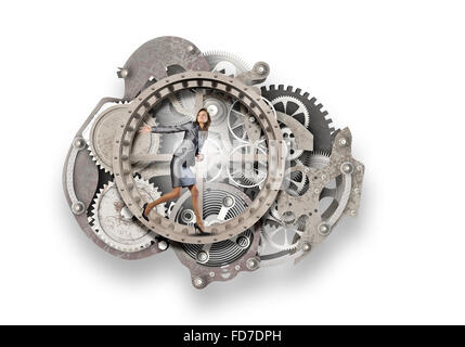 Young businesswoman running in wheel of gears mechanism Stock Photo - Alamy
