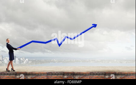 Businesswoman carrying big increasing graph. Growth concept Stock Photo ...