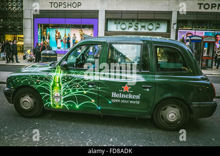 Green London taxi cab advertising says: 'Green is the new black' Stock ...