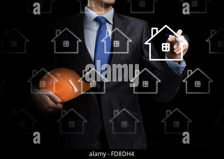Young man engineer drawing sketches of construction project Stock Photo ...