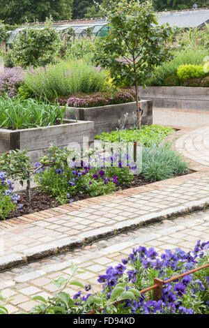 A shallow rill water feature and raised beds. The Kitchen Garden at ...