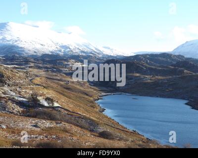 Snowy mountain at the end of Loch Inchard, near Kinlochbervie in ...