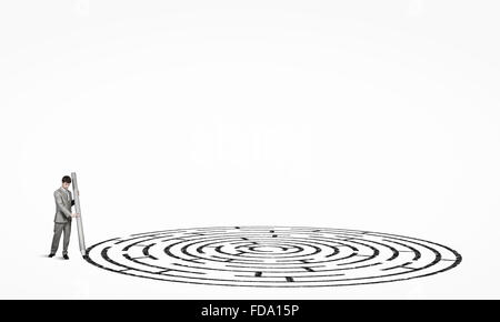 businessman drawing maze Stock Photo - Alamy