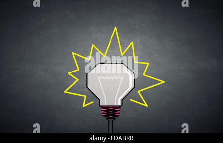 Glowing inverted light bulb on dark background Stock Photo - Alamy