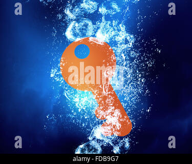 Key sinking in clear blue crystal water Stock Photo - Alamy
