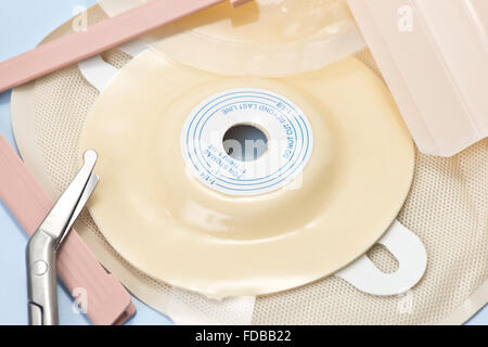 Ostomy supplies, colostomy bag, scissors and disk with scissors for ...