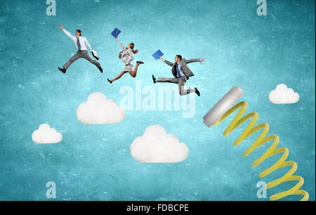 Business people jumping on springboard as progress concept Stock Photo ...