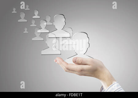 Businessman holding modern social buttons in palm Stock Photo - Alamy