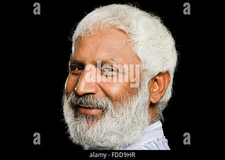 Senior Indian man's face side view portrait on white background Stock ...