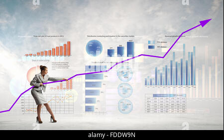 Image of businesswoman pulling graph of diagram Stock Photo - Alamy