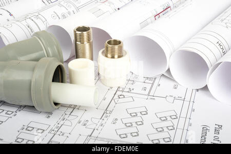 Plumbing fitting on blueprint Stock Photo - Alamy