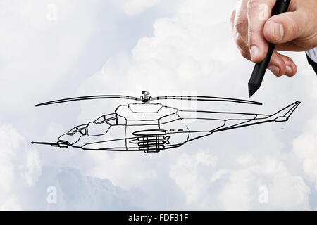 Person hand drawing helicopter model ob sky background Stock Photo - Alamy
