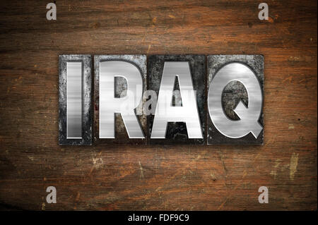 The word "IRAQ" written in vintage ink stained letterpress type Stock ...