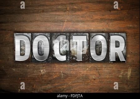 The word "Doctor" written in vintage metal letterpress type isolated on ...