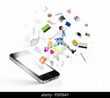 Image of businessman jumping out of mobile phone Stock Photo - Alamy