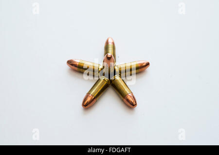 Five-pointed star created from bullets Stock Photo - Alamy