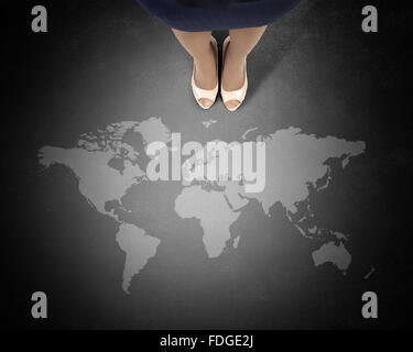 Top view of businesswoman feet and world map on floor Stock Photo - Alamy