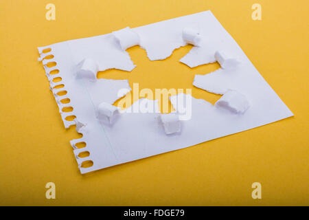 Sun shape made through torn paper in white background Stock Photo - Alamy