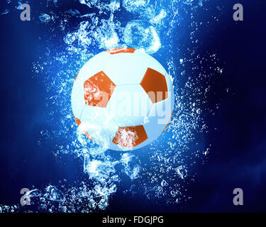 Soccer ball sink in clear blue water Stock Photo - Alamy