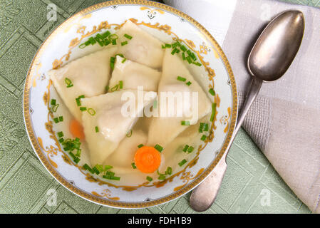 Authentic Jewish triangular-shaped dumplings filled with meat or cheese ...