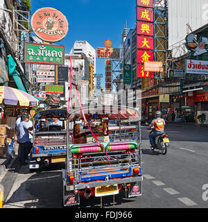 Brightly colored tuk-tuks on Yaowarat Road. Chinatown, Bangkok, Thailand Stock Photo - Alamy
