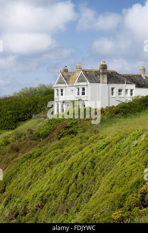 Broom Parc perched on the clifftop at Veryan, near Truro, Cornwall, a ...