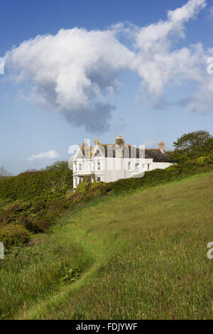 Broom Parc perched on the clifftop at Veryan, near Truro, Cornwall, a ...