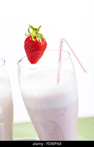 Banana milk shake and fresh fruit banana. Cocktail with milk. White ...
