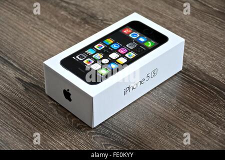 Apple iPhone box on a wood surface Stock Photo - Alamy